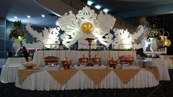 The wedding of Dewi & Robby | PUSPA CATERING | Bridestory