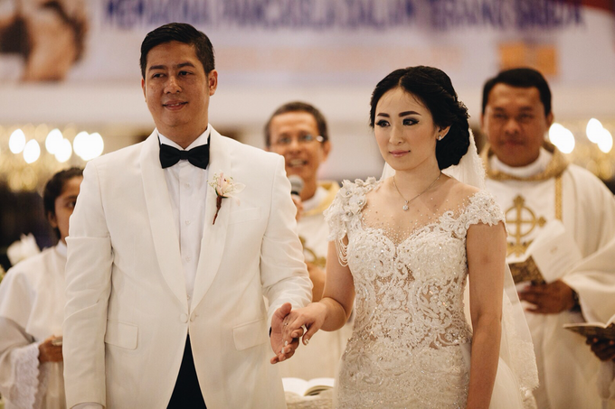 TeaPay Souvenir for Yoyok & Owens by MBTB | Bridestory.com