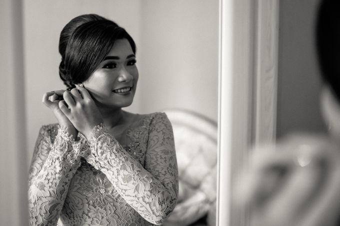 Virda & Fandy Martumpol at HKBP Maranatha by Warna Project | Bridestory.com