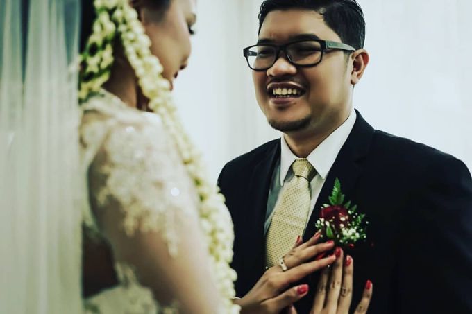 Pemberkatan Dan Resepsi Adat Batak | Adya Wedding Organizer | Bridestory