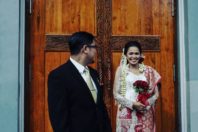 Pemberkatan Dan Resepsi Adat Batak | Adya Wedding Organizer | Bridestory